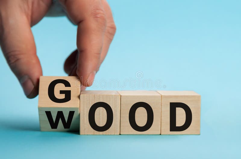 Word Good To Wood. Hand is Turning a Dice and Changes the Word Good To ...