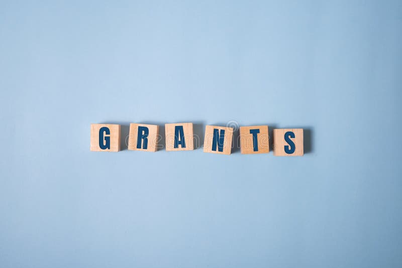 The Word of GRANTS on Building Blocks Concept on Blue Stock Image ...