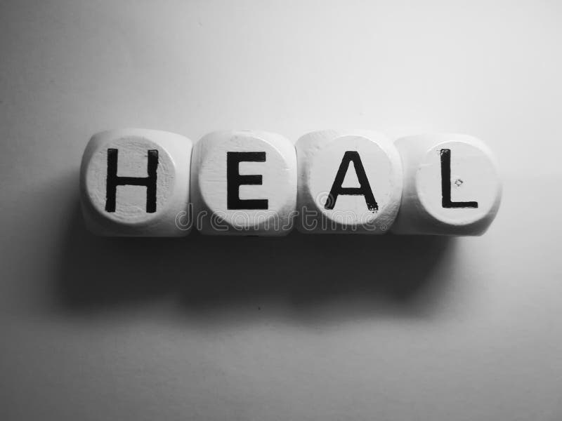 Word heal spelled on dice stock image. Image of font - 122391883