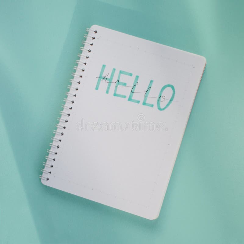 Word `Hello` Written in a Notepad Stock Photo - Image of concept, white ...