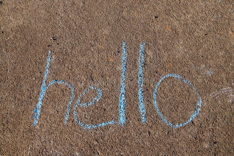 The Word Hello Written with Sidewalk Chalk on Gray Concrete Pavement ...