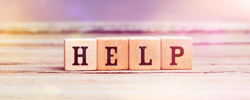 Word Help with Wood Cubes on Table Stock Image - Image of shot ...