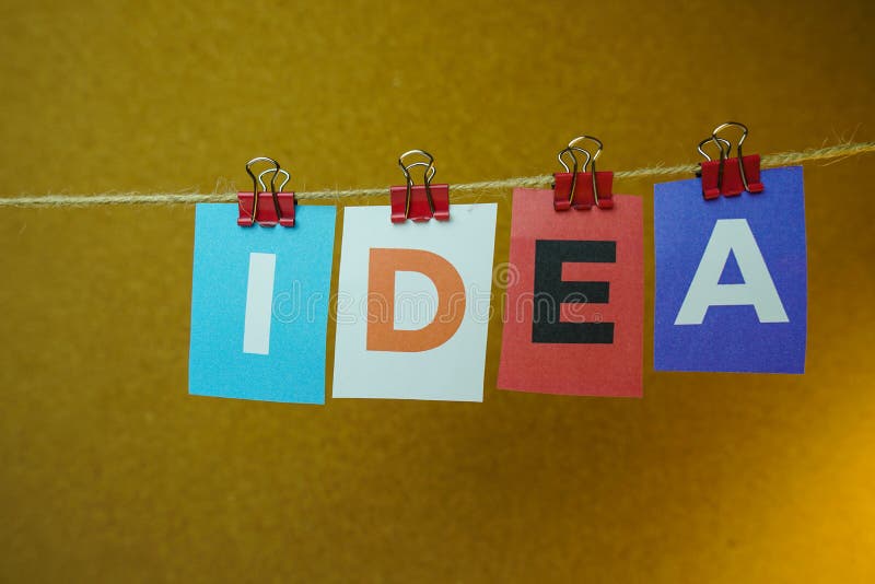 The Word IDEA Written on Colorful Note Papers on Board Background. Idea ...