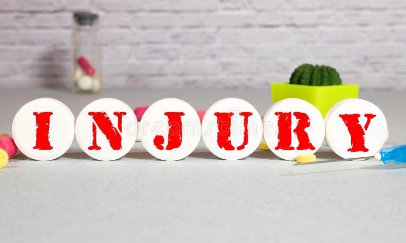 Word Injury on White Pils. Medical Concept Stock Image - Image of ...