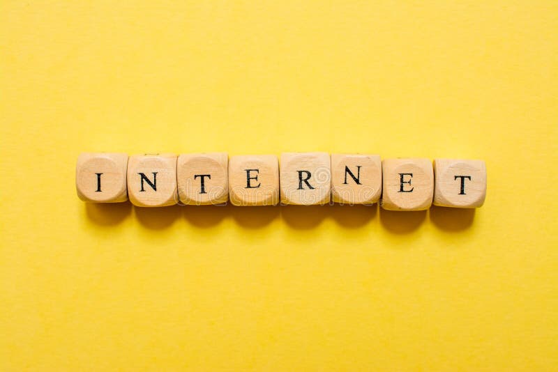 The Word Internet, Text Made with Dice on Yellow Background Stock Image ...