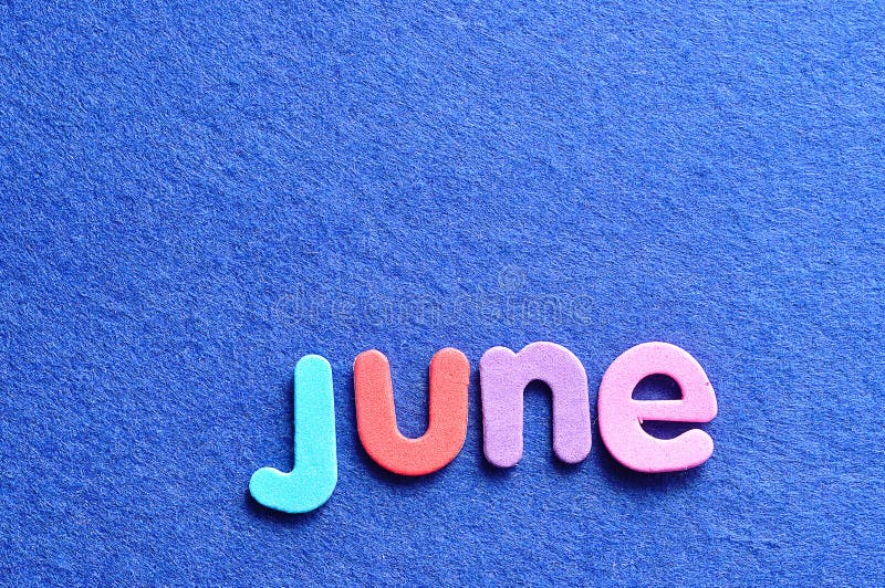 June on a blue background stock photo. Image of blue - 110385530