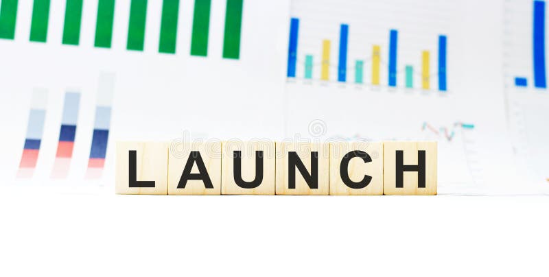 Word Launch on Keyboard Background, Word Made with Wooden Blocks Stock ...