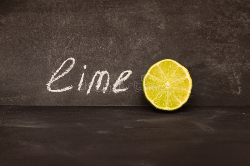 The Word Lime is Written on a Dark Background in White Chalk with the ...