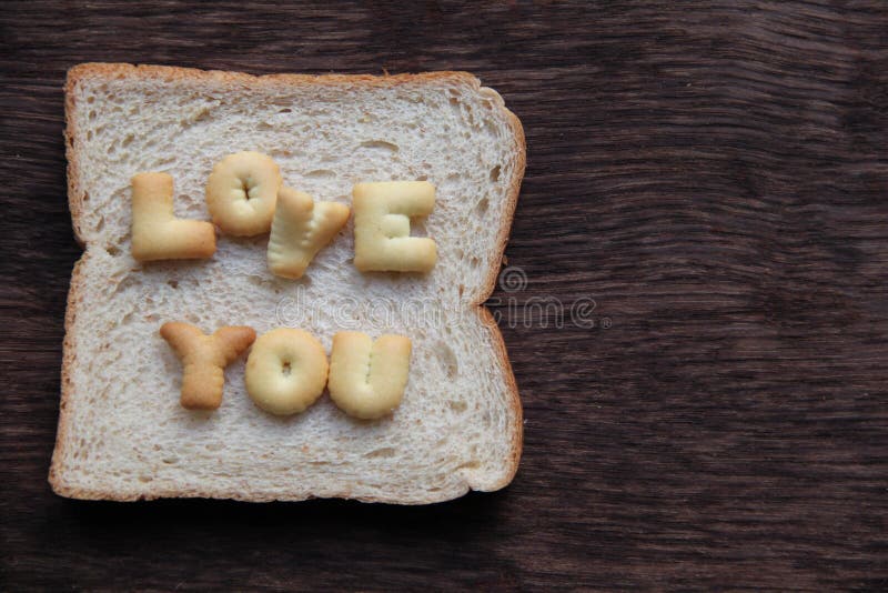 The word love on bread. stock photo. Image of goods, affection - 44259662