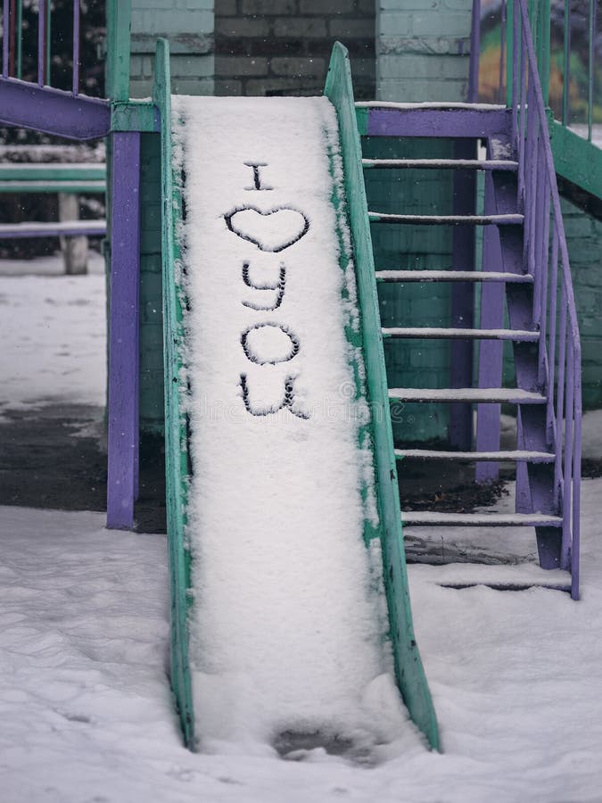 The Word Love is Drawn with Your Finger on the Snow Surface. Stock ...