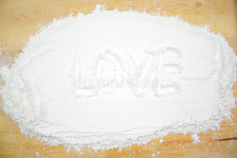 Word love on flour stock image. Image of cutting, symbol - 46039275