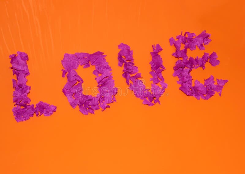 The Word Love on an Orange Background. Love from Pieces of Pink Paper ...