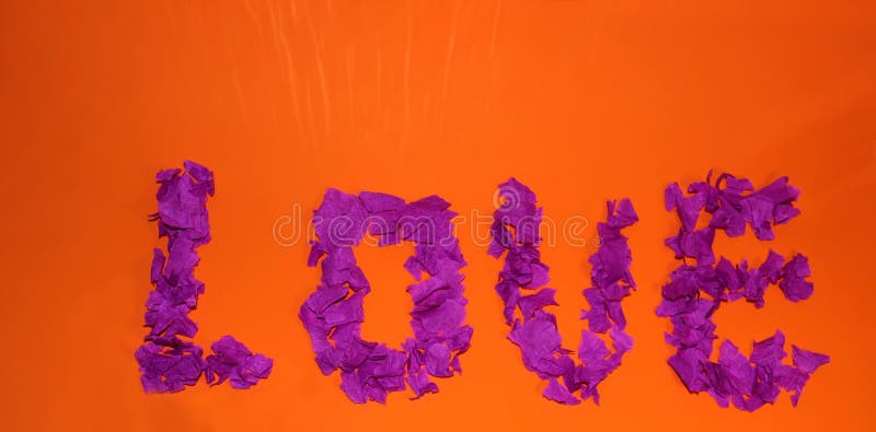 The Word Love on an Orange Background. Love from Pieces of Pink Paper ...