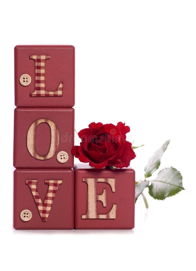 Word love with red rose stock photo. Image of blocks - 31124598