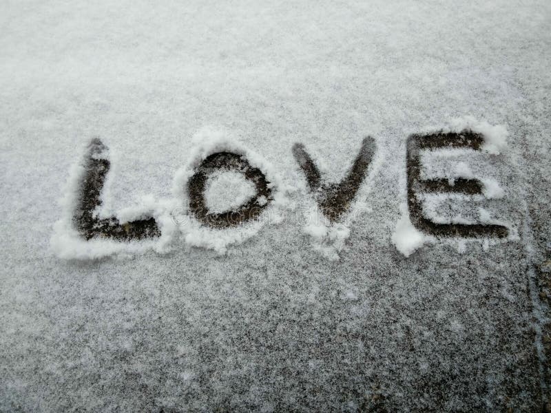 Love Written in the Snow stock image. Image of romantic - 140336189