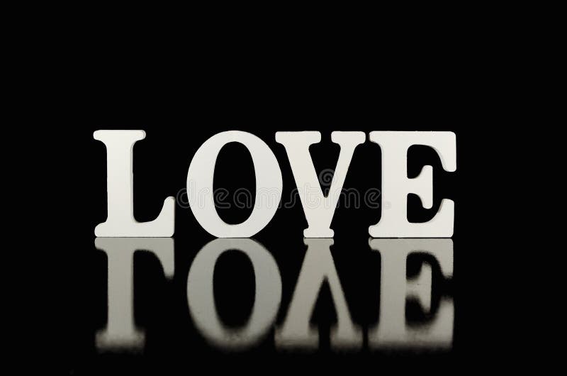 Word Of Love In Black And White On A Wooden Background Stock Image ...