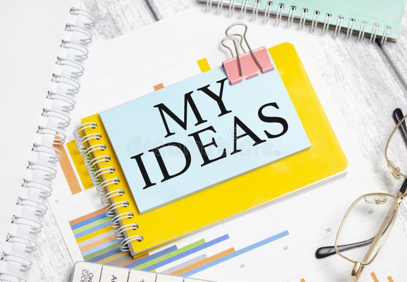 Word My Ideas on Blue Sticker with Charts and Glasses Stock Image ...
