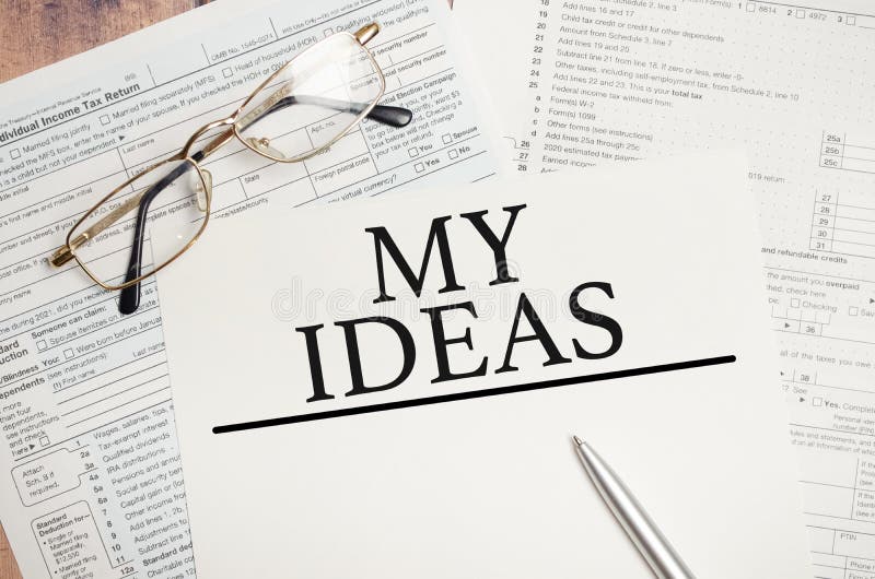 Word My Ideas on on Paper with Tax Forms and Glasses Stock Photo ...