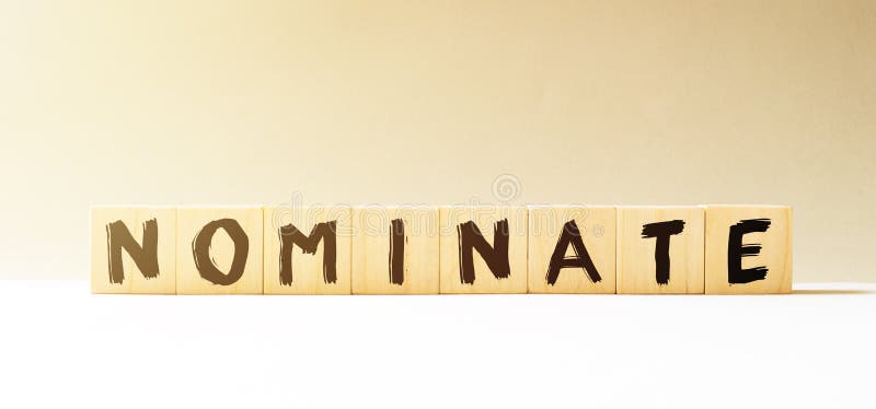 Word NOMINATE Made with Wood Building Blocks Stock Photo - Image of ...