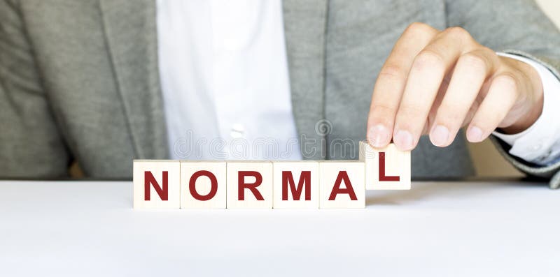 Word NORMAL Made with Wood Building Blocks. New Normal Stock Image ...