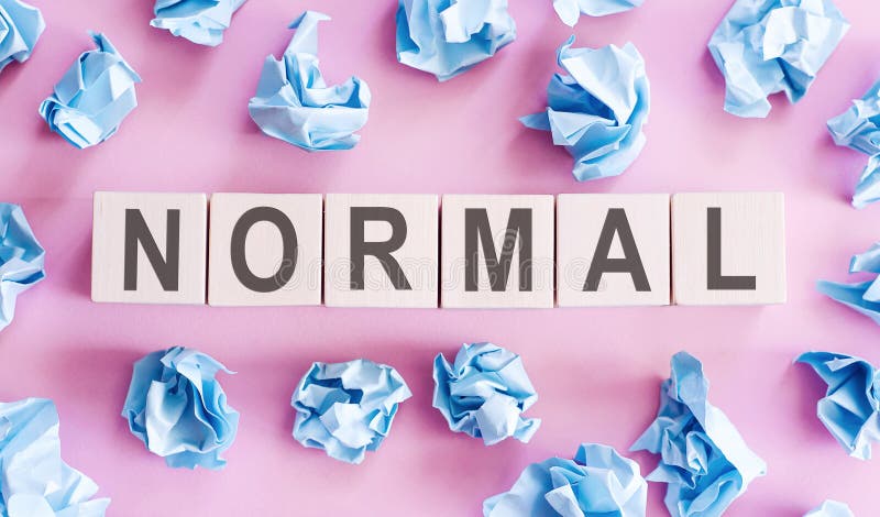 The Word Balance in a Wooden Frame on a Table with a Laptop and Pens ...