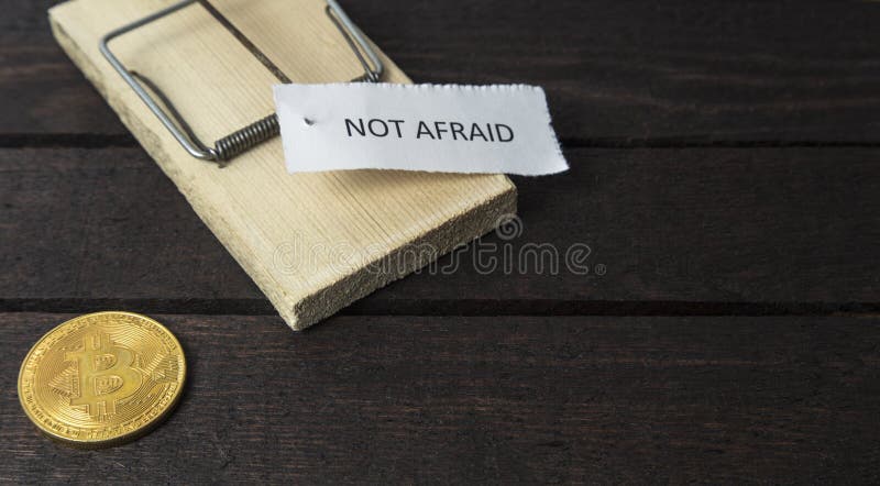 The Word: Not Afraid Pinned on Mouse Trap with Bitcoin. Stock Photo ...