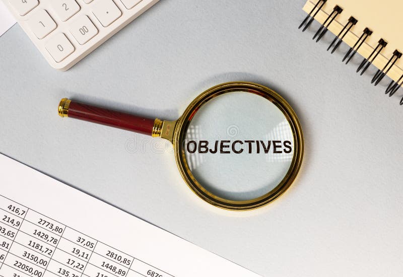 Word Objectives through Magnifier on Office Desk, Top View. Bsiness ...