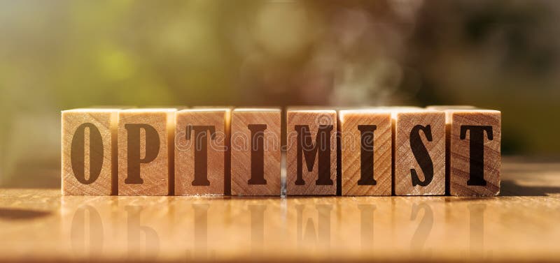 Word OPTIMIST Made with Building Wooden Blocks on Table in Sunlight ...