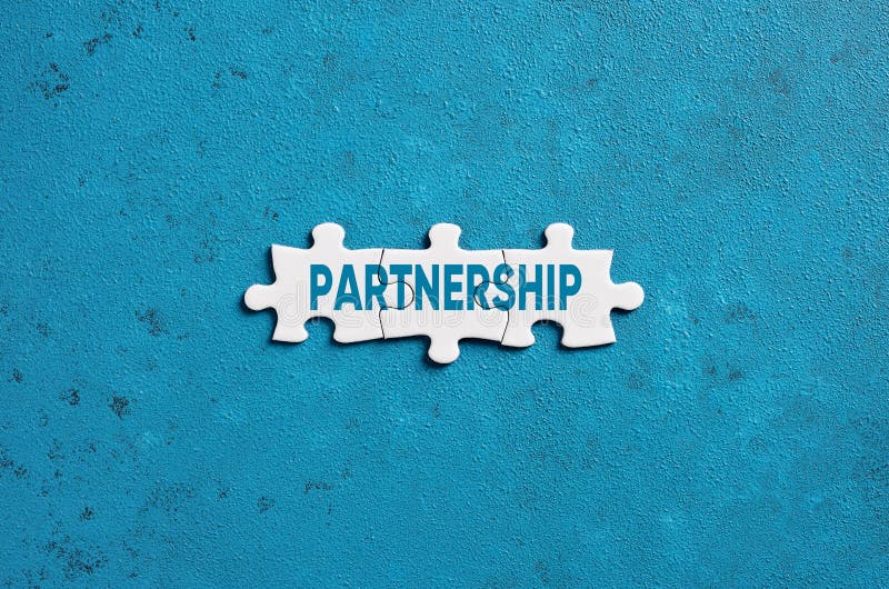 The Word Partnership Written on Puzzle Pieces on Blue Background Stock ...