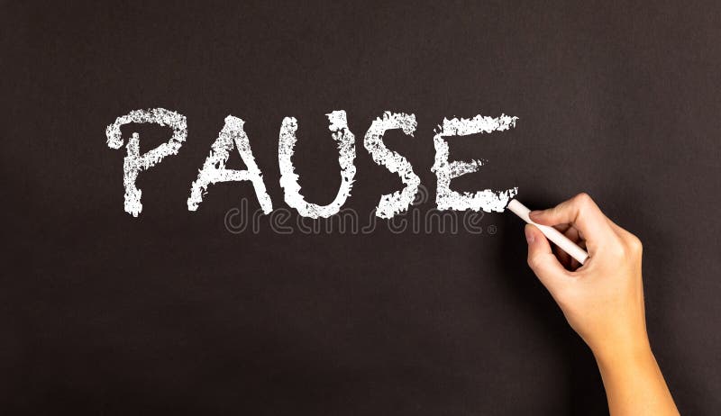 The Word Pause is Written on a Piece of Paper that the Quarantined Girl ...