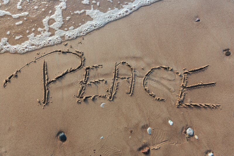The Word `Peace` on the Sea Sand, Written with Stick on the Beach ...