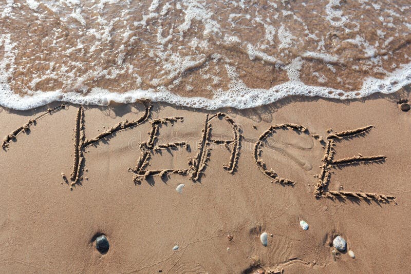 The Word `Peace` on the Sea Sand, Written with Stick on the Beach ...
