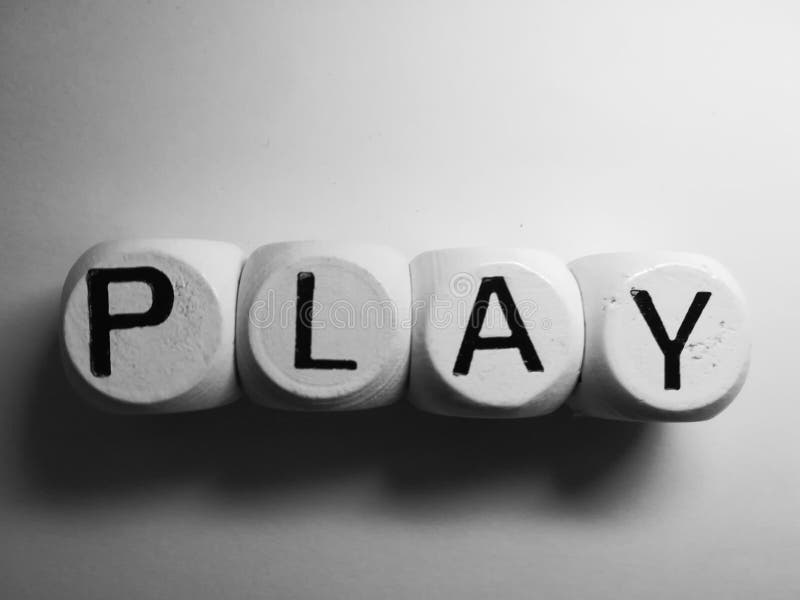 Word play spelled on dice stock photo. Image of wooden - 122392372