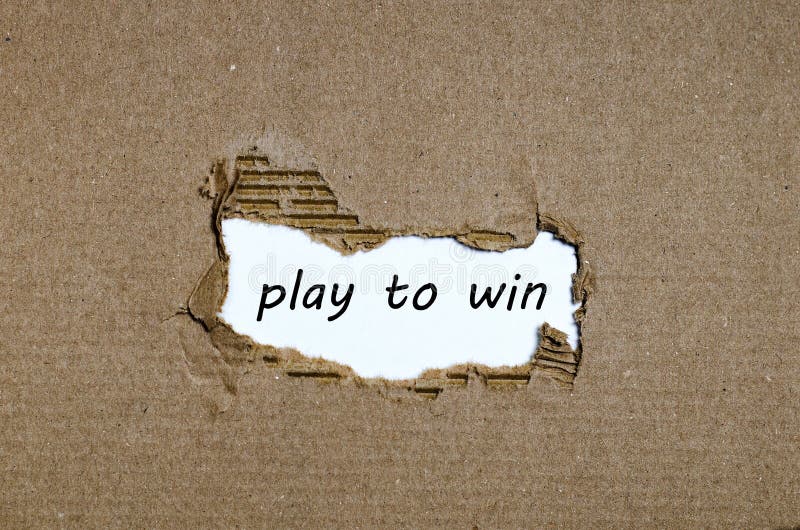 The Word Play To Win Appearing Behind Torn Paper Stock Image - Image of ...