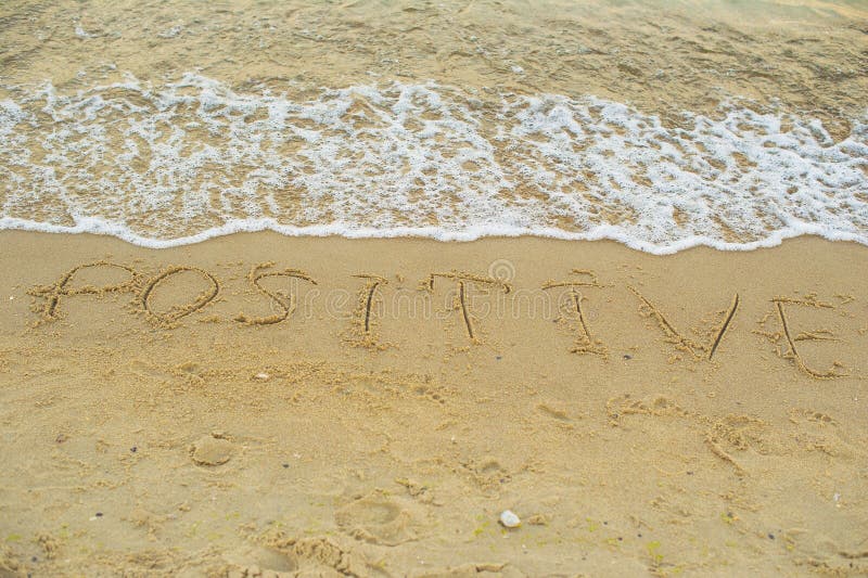 Word Positive Written on the Beach Sand Stock Photo - Image of sign ...