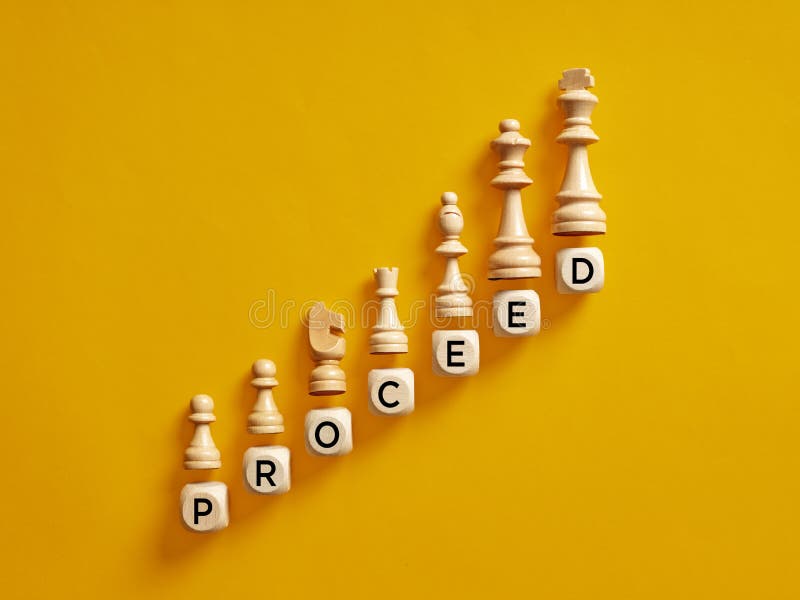 The Word Proceed on Wooden Cubes with Chess Pieces Stock Photo - Image ...