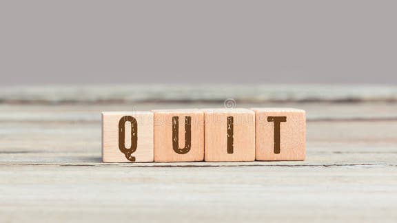 Word Quit on wood cubes stock photo. Image of cube, quit - 257133504