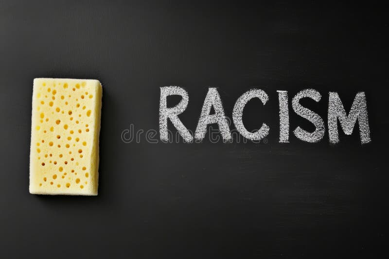 The Word Racism Written with Chalk on the Blackboard, Next To it is a ...