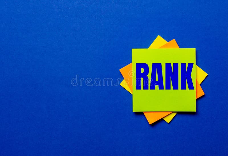 The Word RANK is Written on Bright Stickers on a Blue Background Stock ...