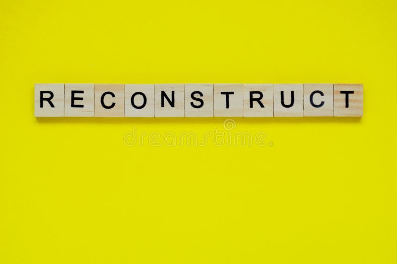 Word Reconstruct. Top View of Wooden Blocks with Letters on Yellow ...