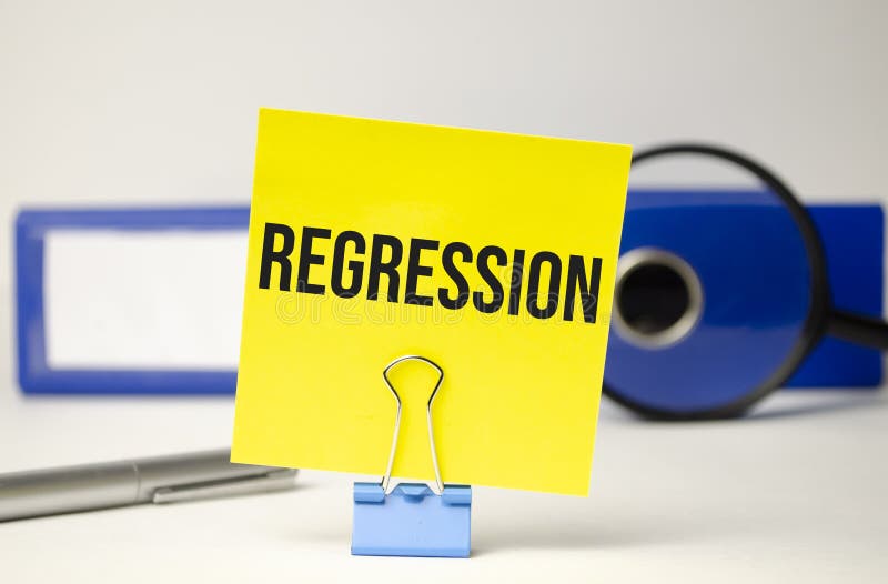 Word Regression on Yellow Sticker and Blue Folder Stock Photo - Image ...