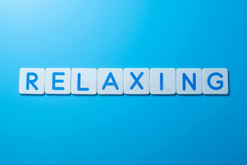 Word RELAXING on Blue Background,RELAXING Concept Stock Image - Image ...