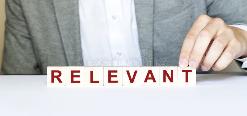 Word RELEVANT Made with Wood Building Blocks Stock Image - Image of ...