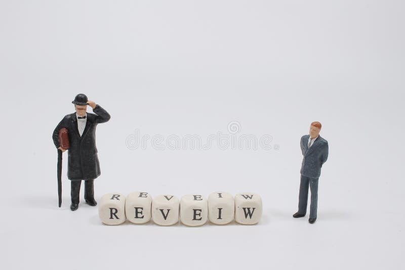 A Word REVIEW on Wooden Cube Block with Figure Stock Image - Image of ...