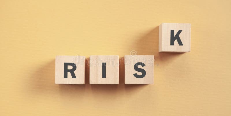 Word Risk on wooden cube stock image. Image of planning - 217998865
