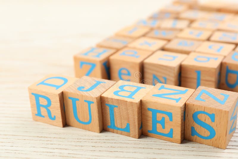 Word Rules Made of Cubes with Letters on Table, Top View Stock Image ...