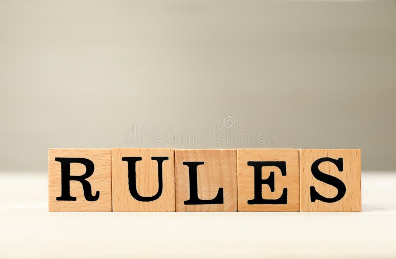Word Rules Made of Cubes with Letters on Light Wooden Table Stock Image ...
