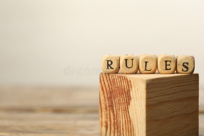 Word Rules Made of Cubes with Letters on Wooden Block, Space for Text ... Word Rules Made of Cubes with Letters on Wooden Block, Space for Text ...