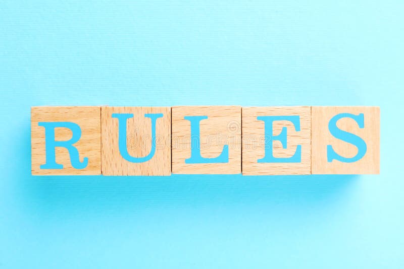 Word Rules Made of Wooden Cubes with Letters on Light Blue Background ...
