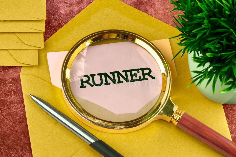The Word RUNNER through a Magnifying Glass on a Note from an Envelope ...